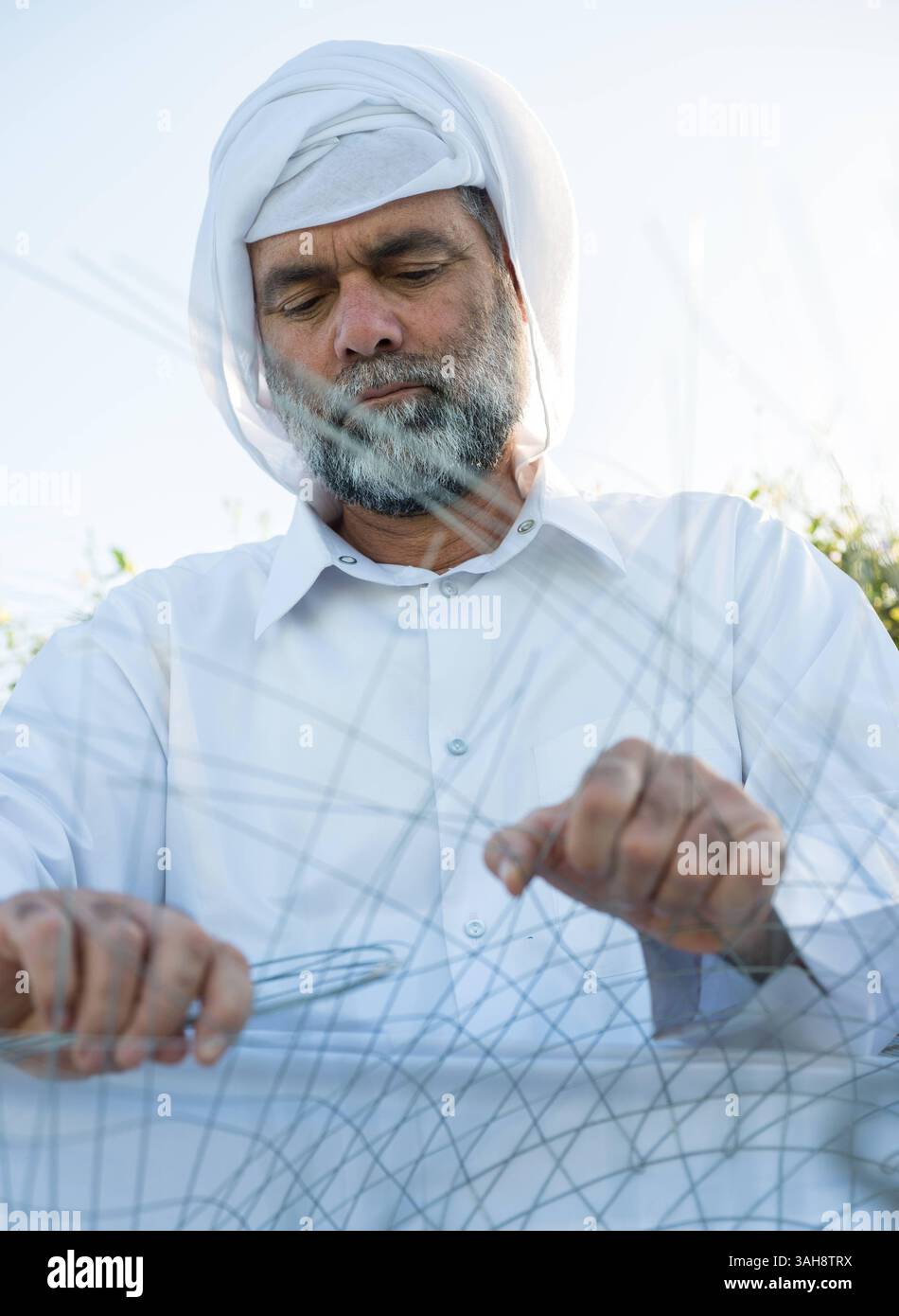FIRST FISHING EXHIBITION IN QATAR A Qatari man display their skills on ...