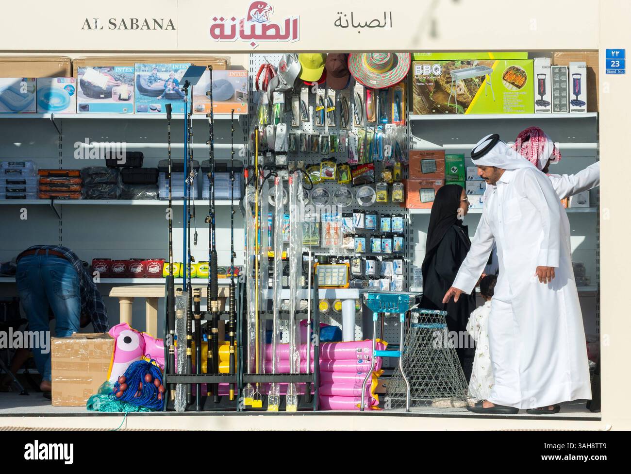 FIRST FISHING EXHIBITION IN QATAR People visit a stall selling fishing ...