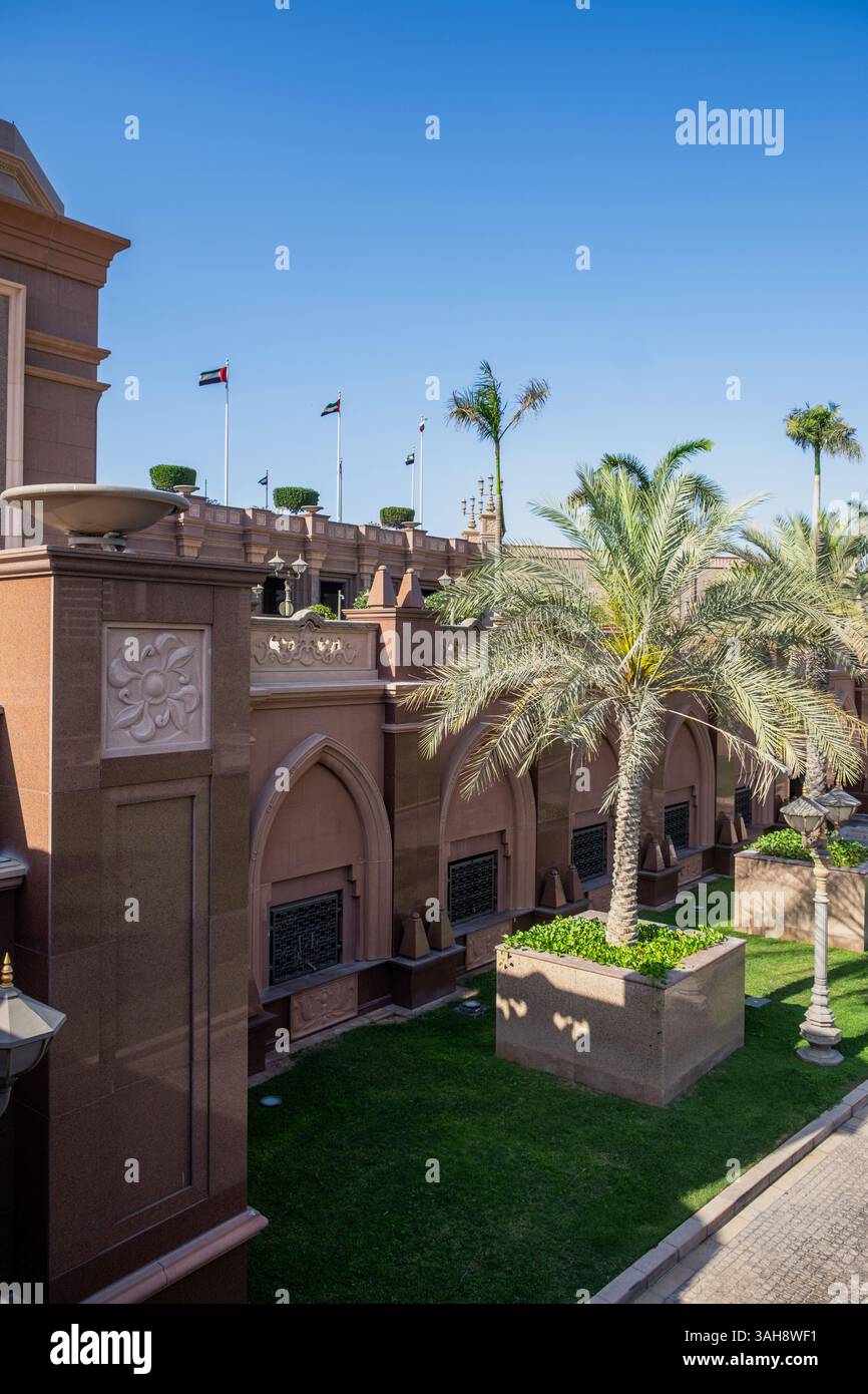 Arabesque architecture, arched windows and palm trees, Emirates Palace ...