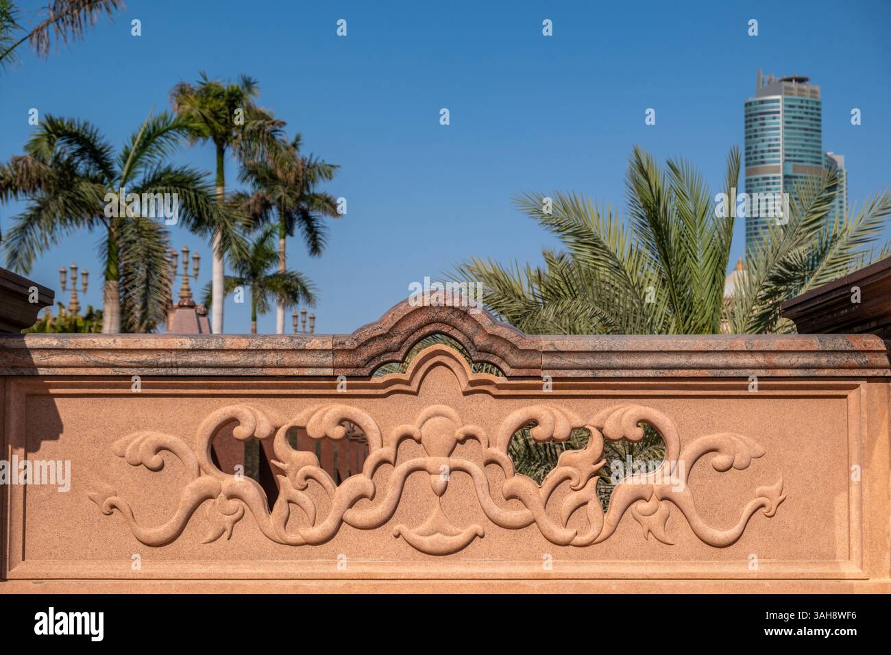 Arabesque architecture, decorative balustrade and palm trees, Emirates ...