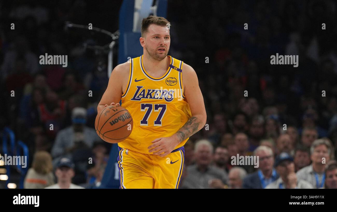 Los Angeles Lakers guard Luka Doncic pushes down the court during the ...