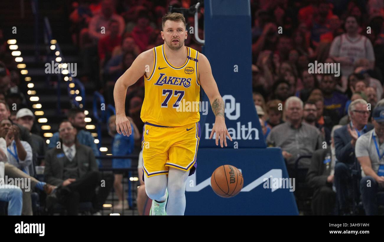 Los Angeles Lakers guard Luka Doncic pushes down the court during the ...