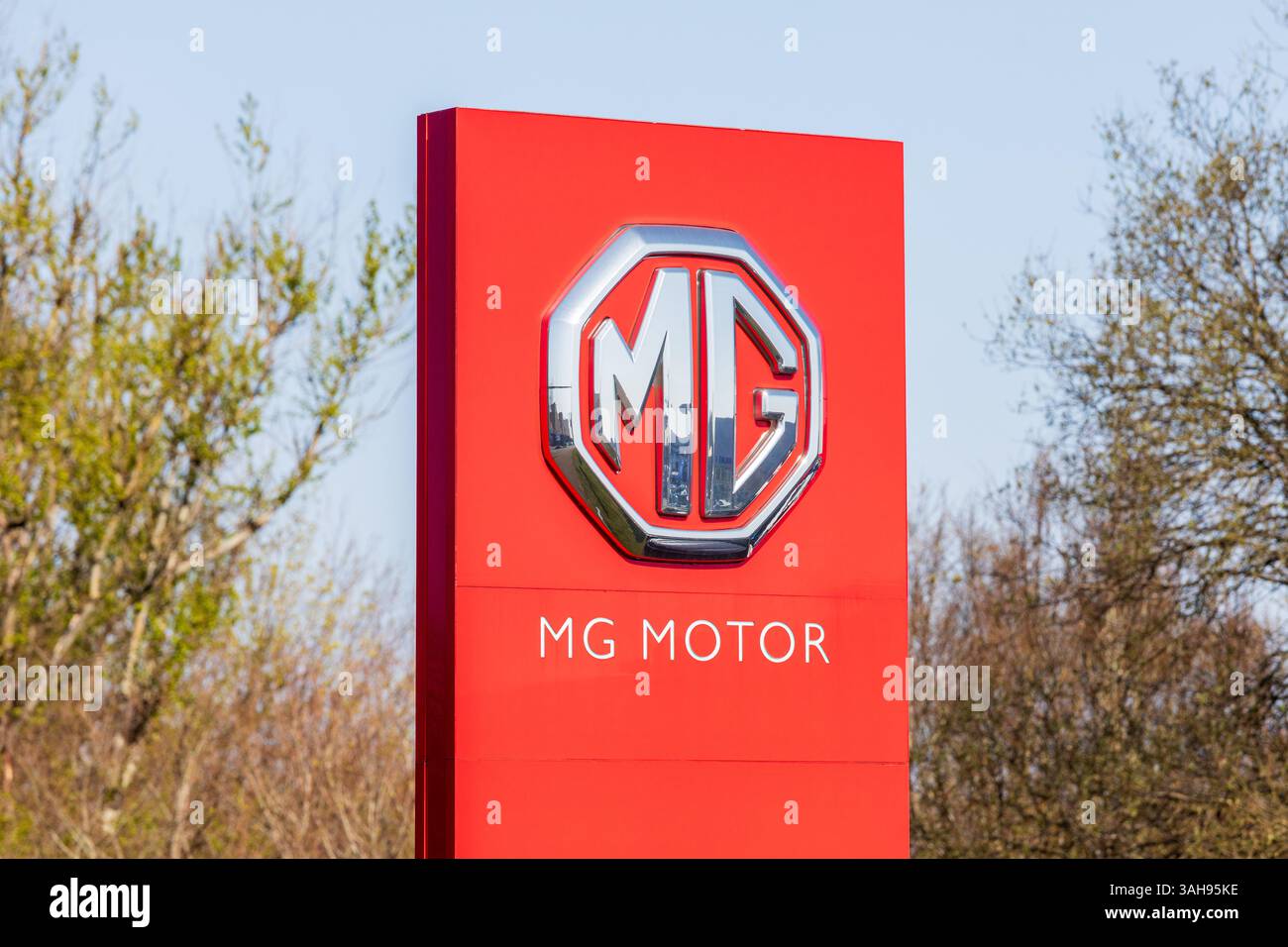 Logo sign for MG motor cars, outside a vehicle outlet Stock Photo - Alamy