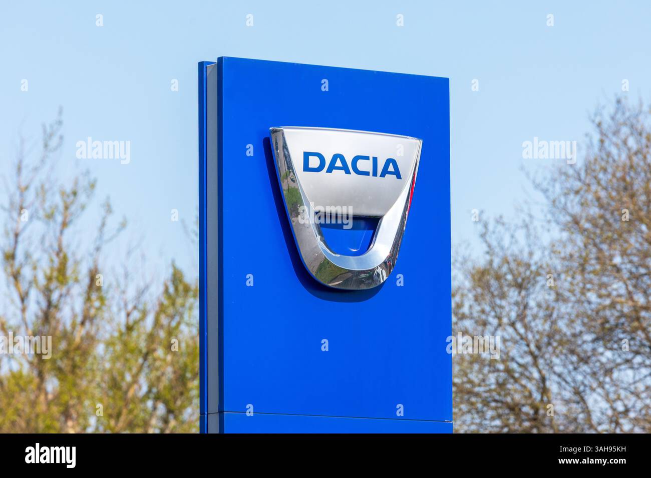 Logo sign for Dacia motor cars, outside a vehicle outlet Stock Photo ...
