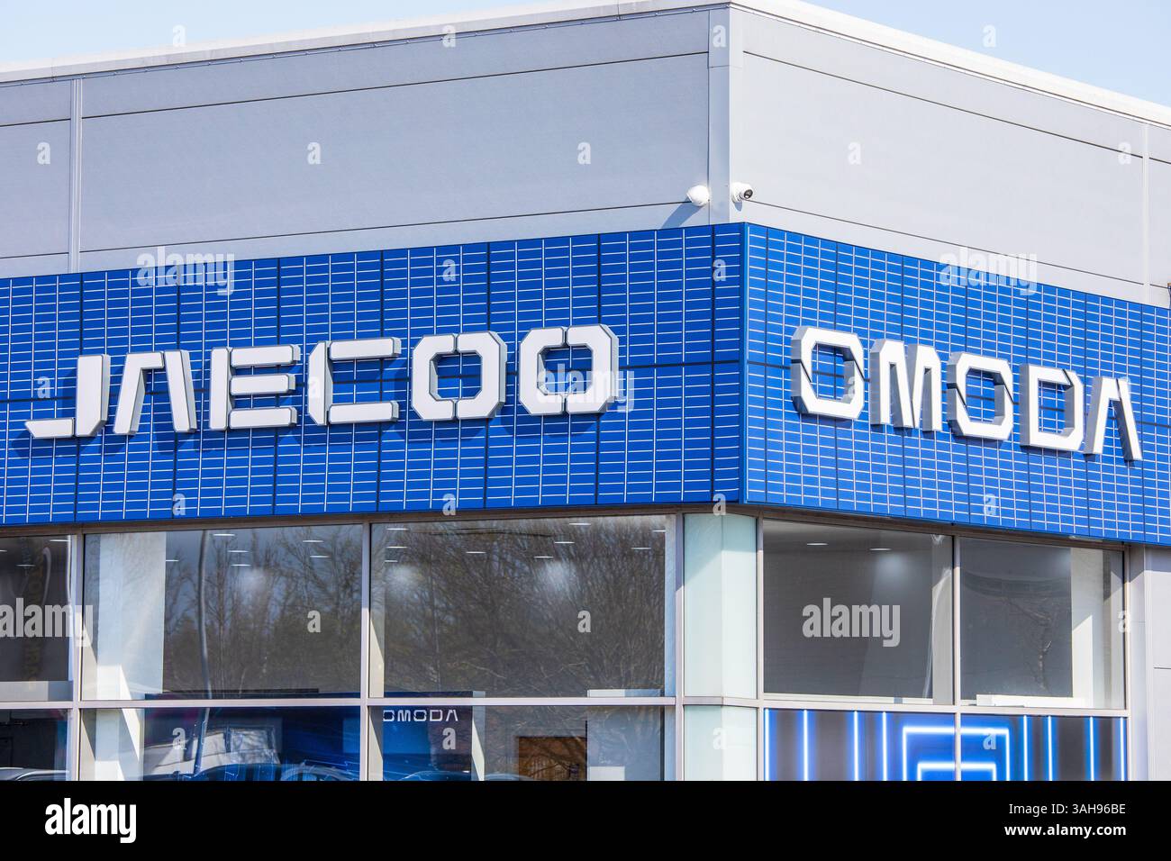 Logo sign for Omoda Jaecoo motor cars, outside a vehicle outlet Stock ...