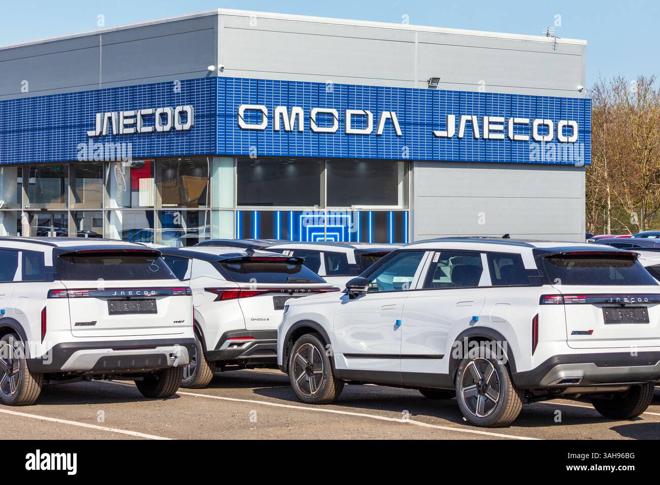 Logo sign for Omoda Jaecoo motor cars, outside a vehicle outlet Stock ...