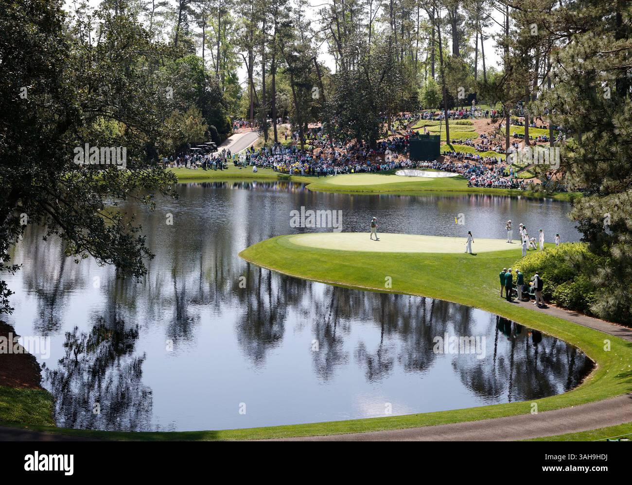 Augusta, United States. 09th Apr, 2025. Spectators watch golfers on the ...