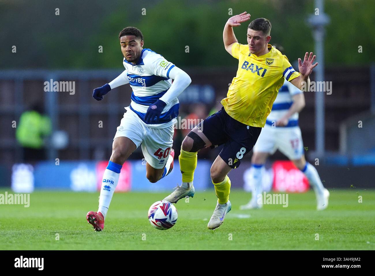 Queens Park Rangers' Jonathan Varane (left) and Oxford United's Cameron ...
