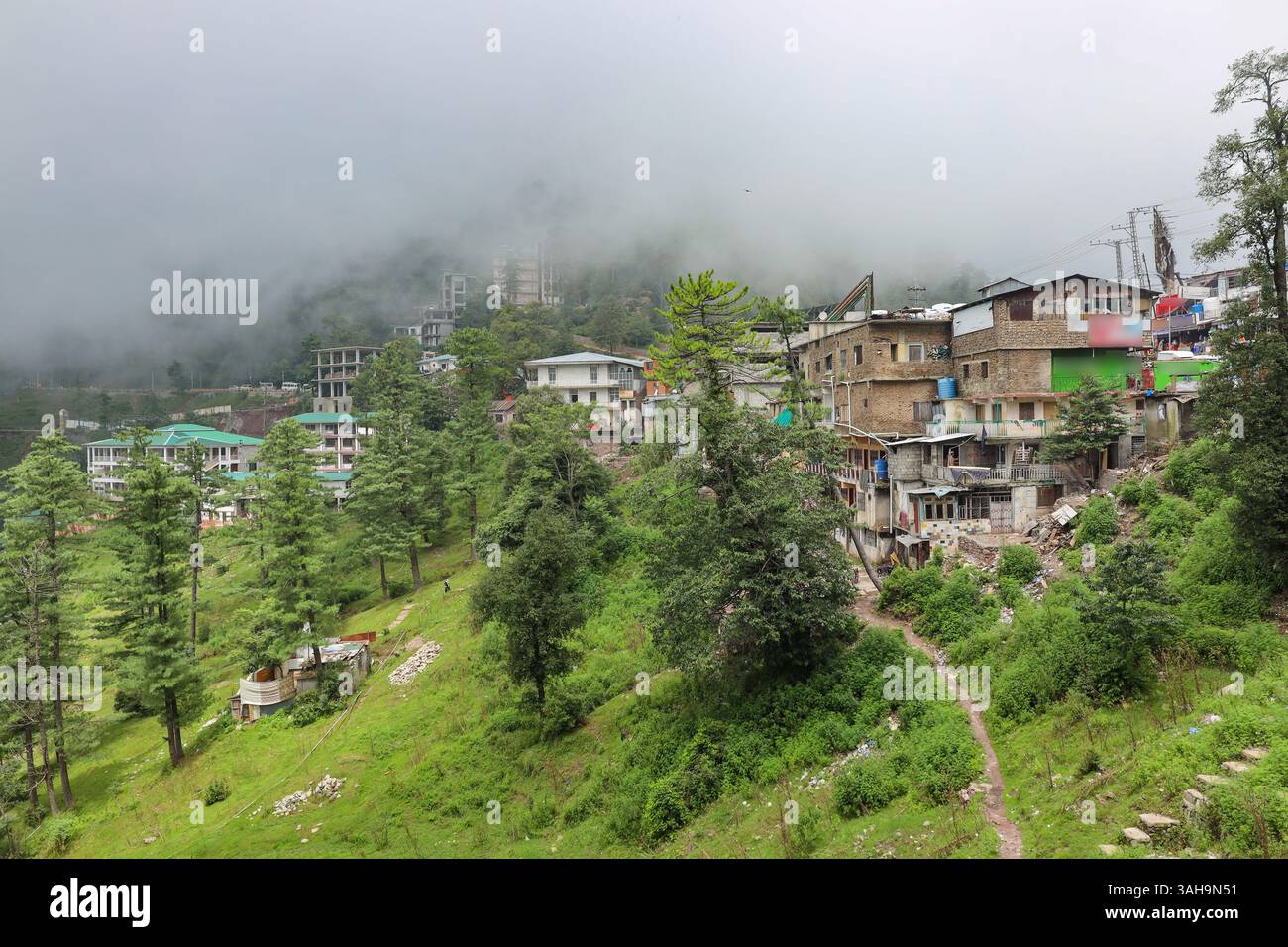 Lush green summer views of Murree, Punjab, Pakistan: houses and ...