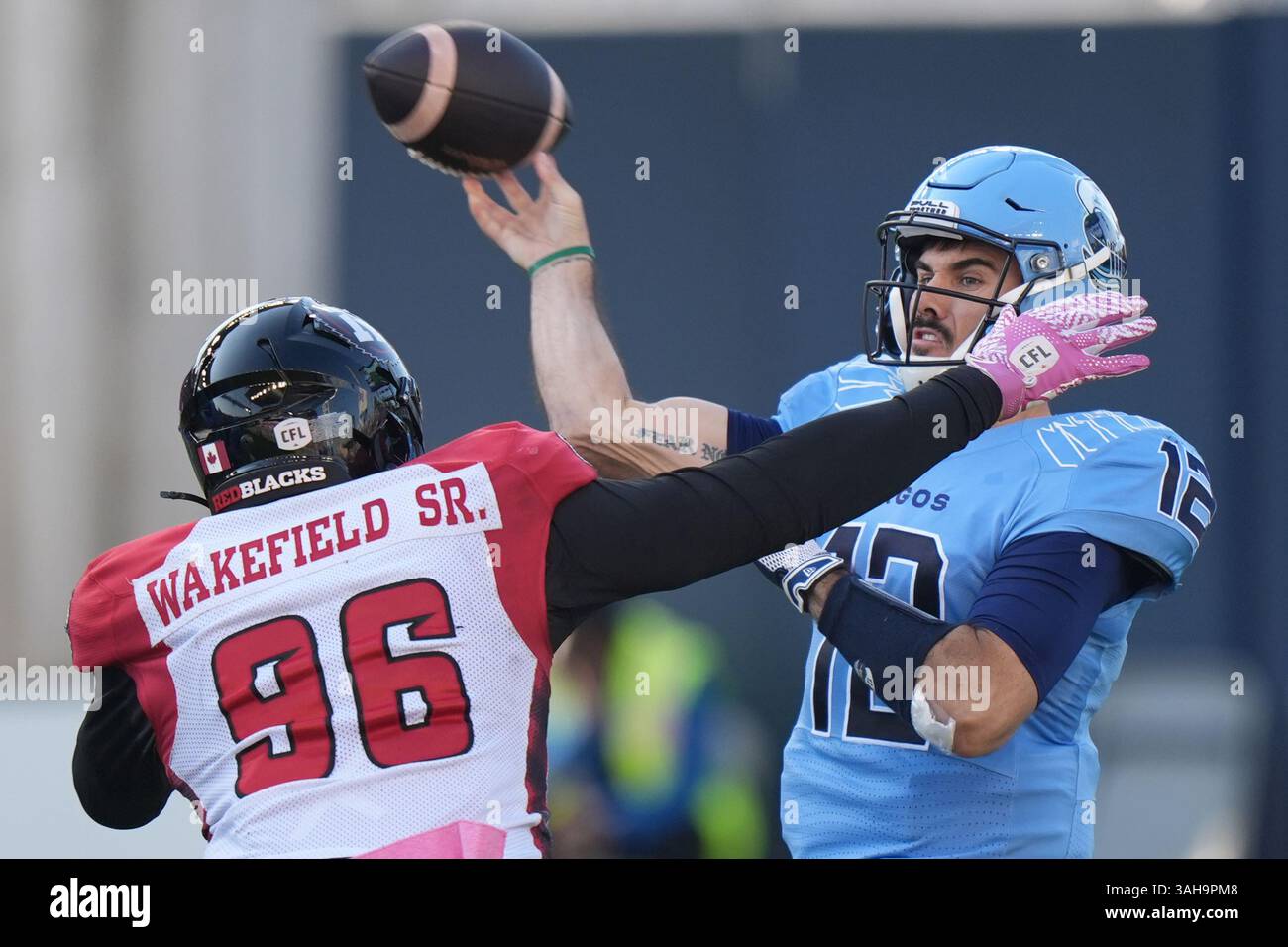 Toronto Argonauts quarterback Chad Kelly (12) makes a throw downfield ...