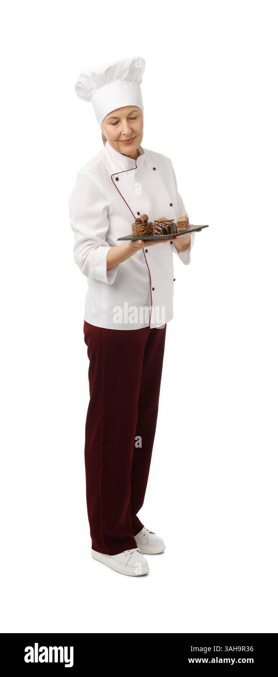 Professional pastry chef with desserts on white background Stock Photo ...