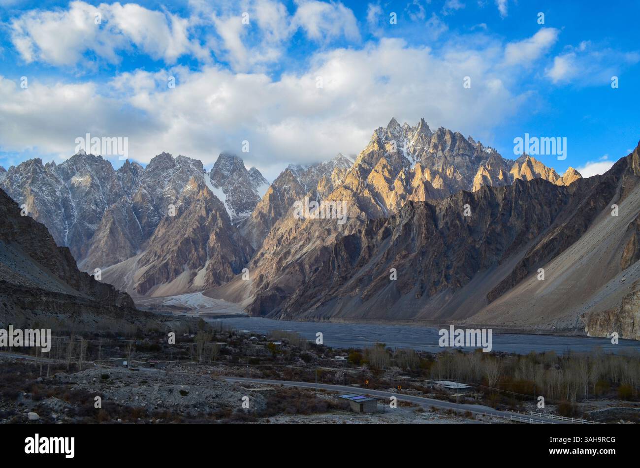Sunlit Passu Cones piercing summer skies above Upper Hunza, Gilgit ...