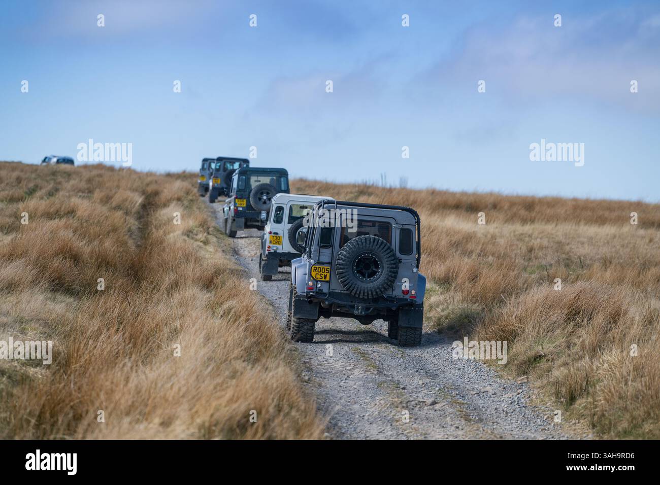 Land Rover Defenders travelling down some rough Green Lanes in the ...