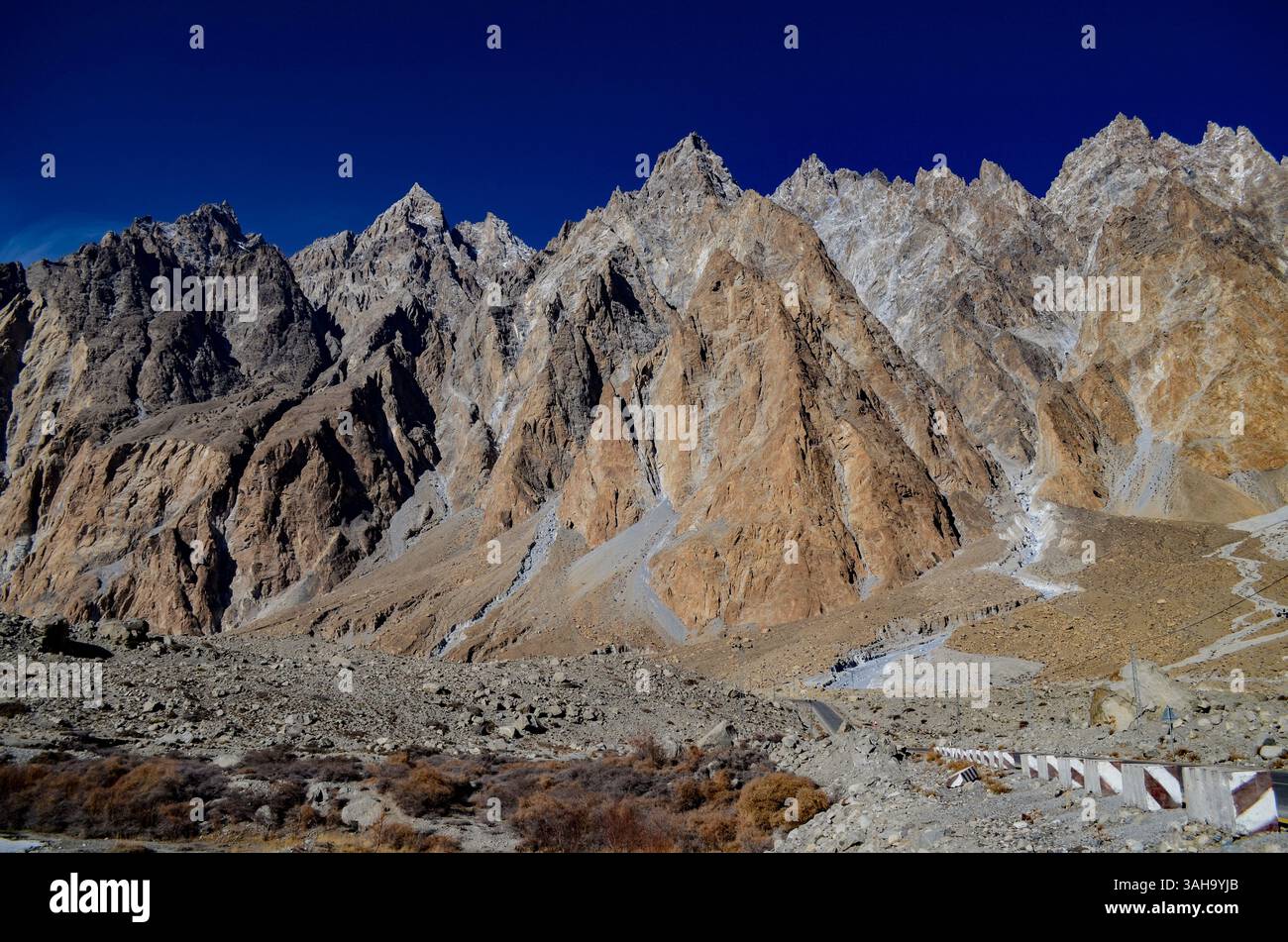 Sunlit Passu Cones piercing summer skies above Upper Hunza, Gilgit ...
