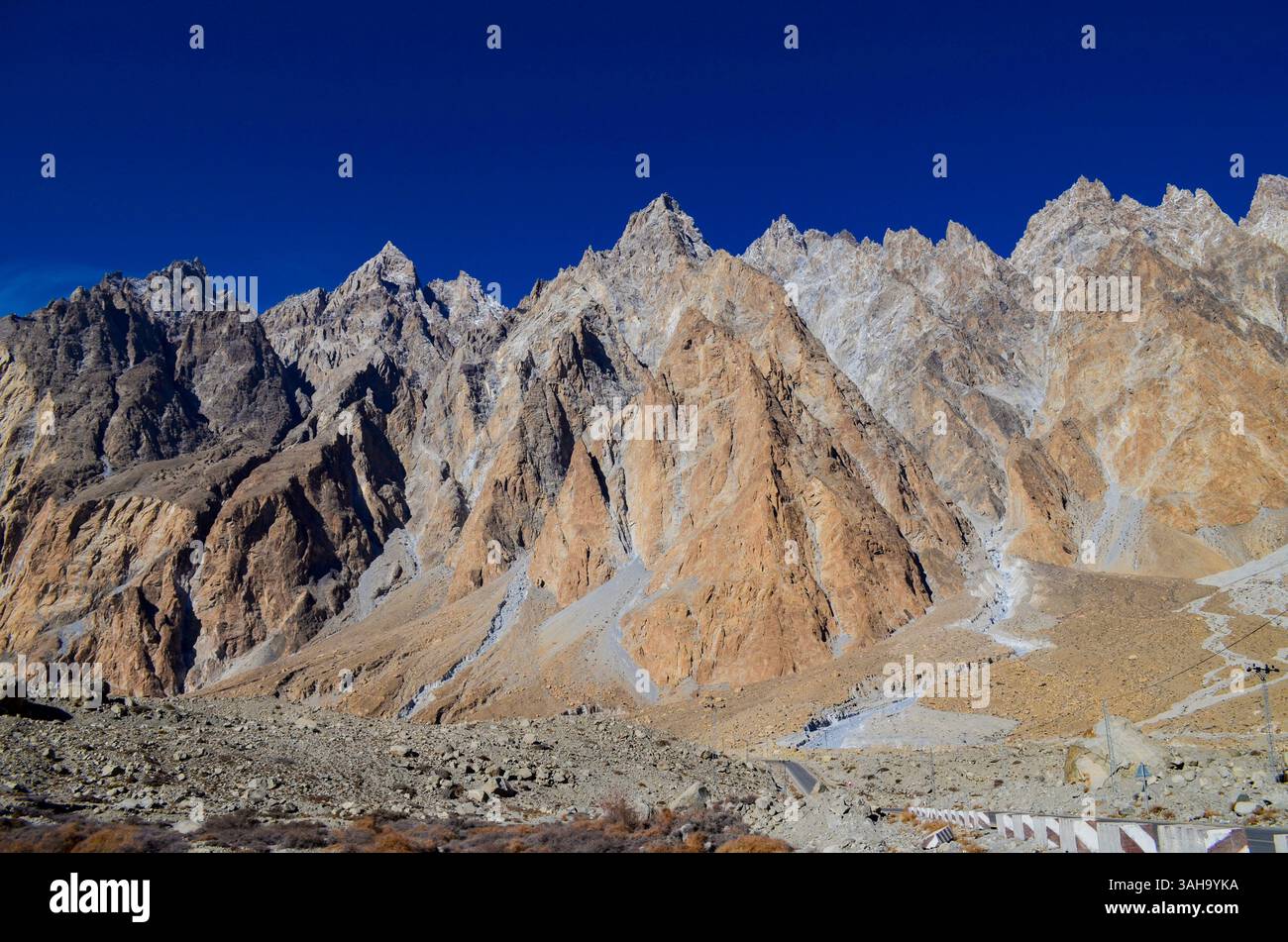 Sunlit Passu Cones piercing summer skies above Upper Hunza, Gilgit ...