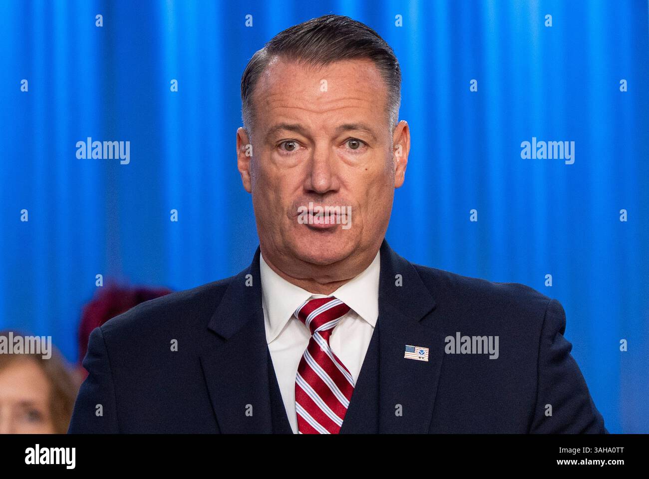 Immigration and Customs Enforcement acting director Todd Lyons listens ...