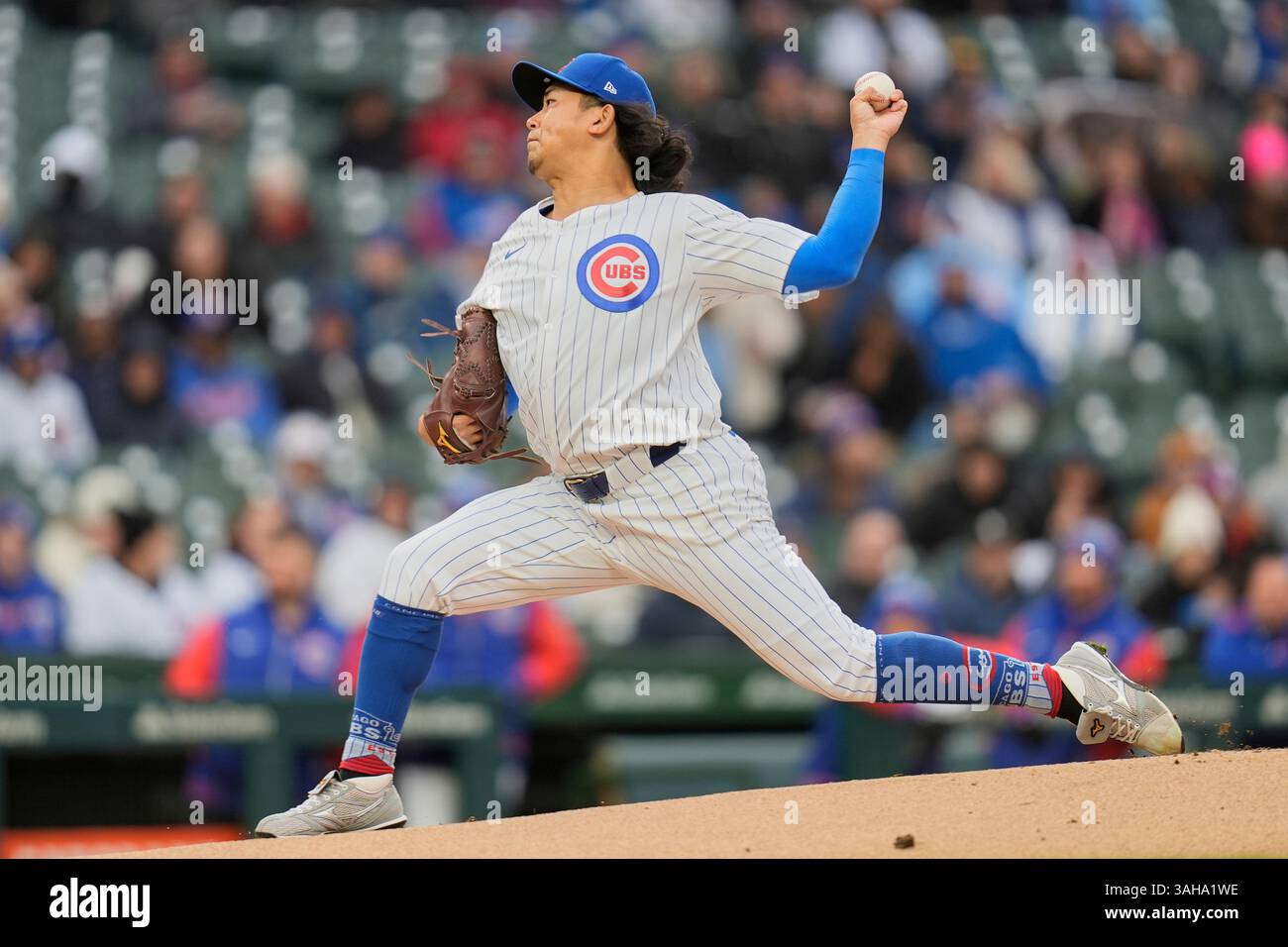 Chicago Cubs starting pitcher Shota Imanaga (18) throws against the ...