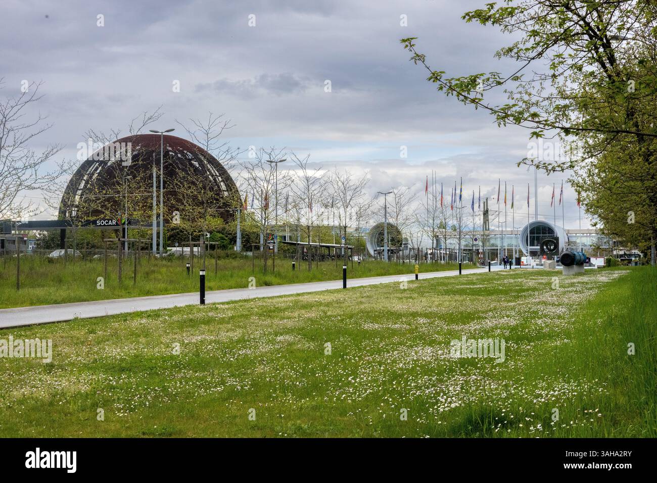 The Globe of Science and Innovation at CERN stands prominently behind ...