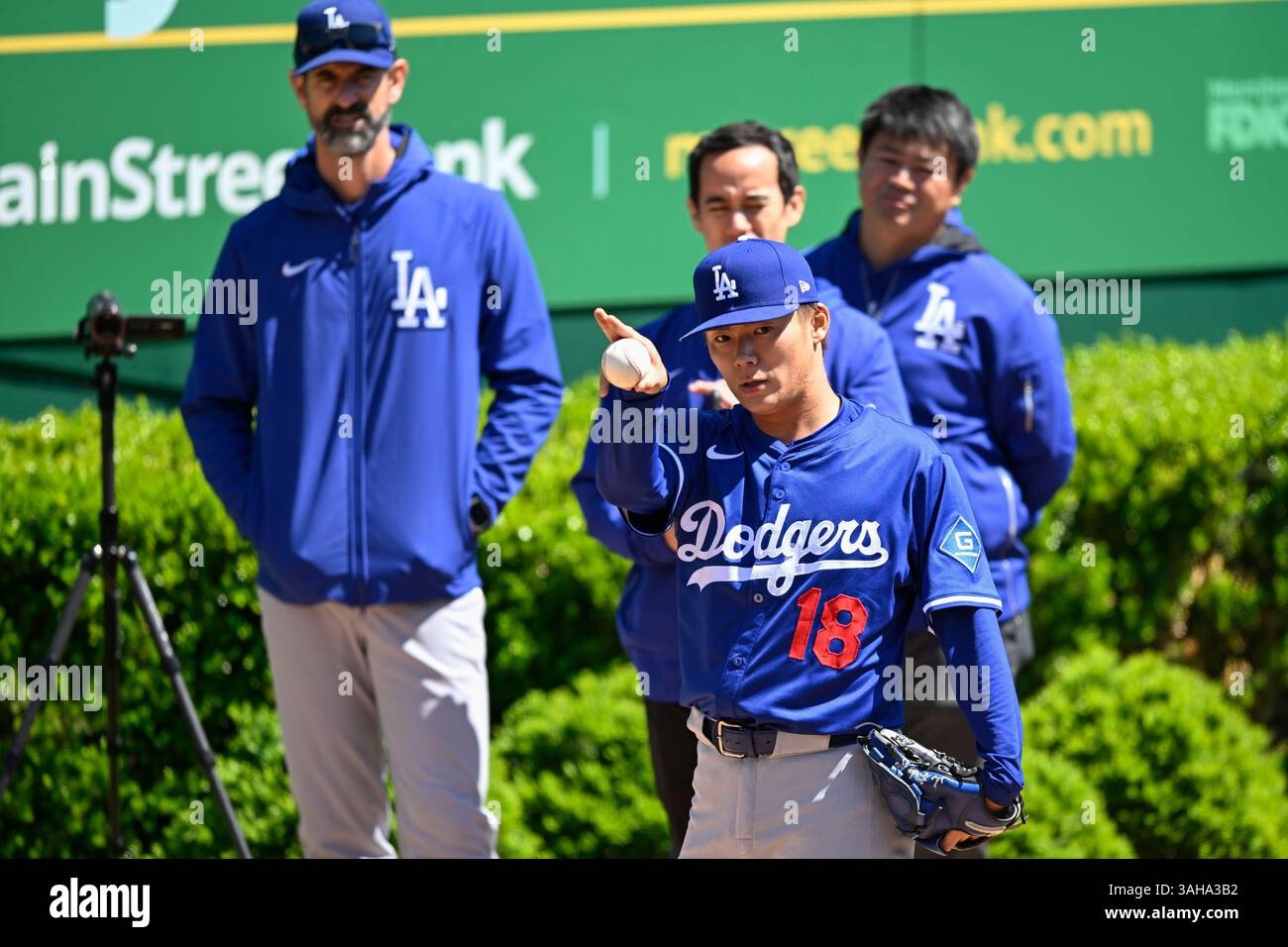 Los Angeles Dodgers pitcher Yoshinobu Yamamoto (18) practices pitching ...