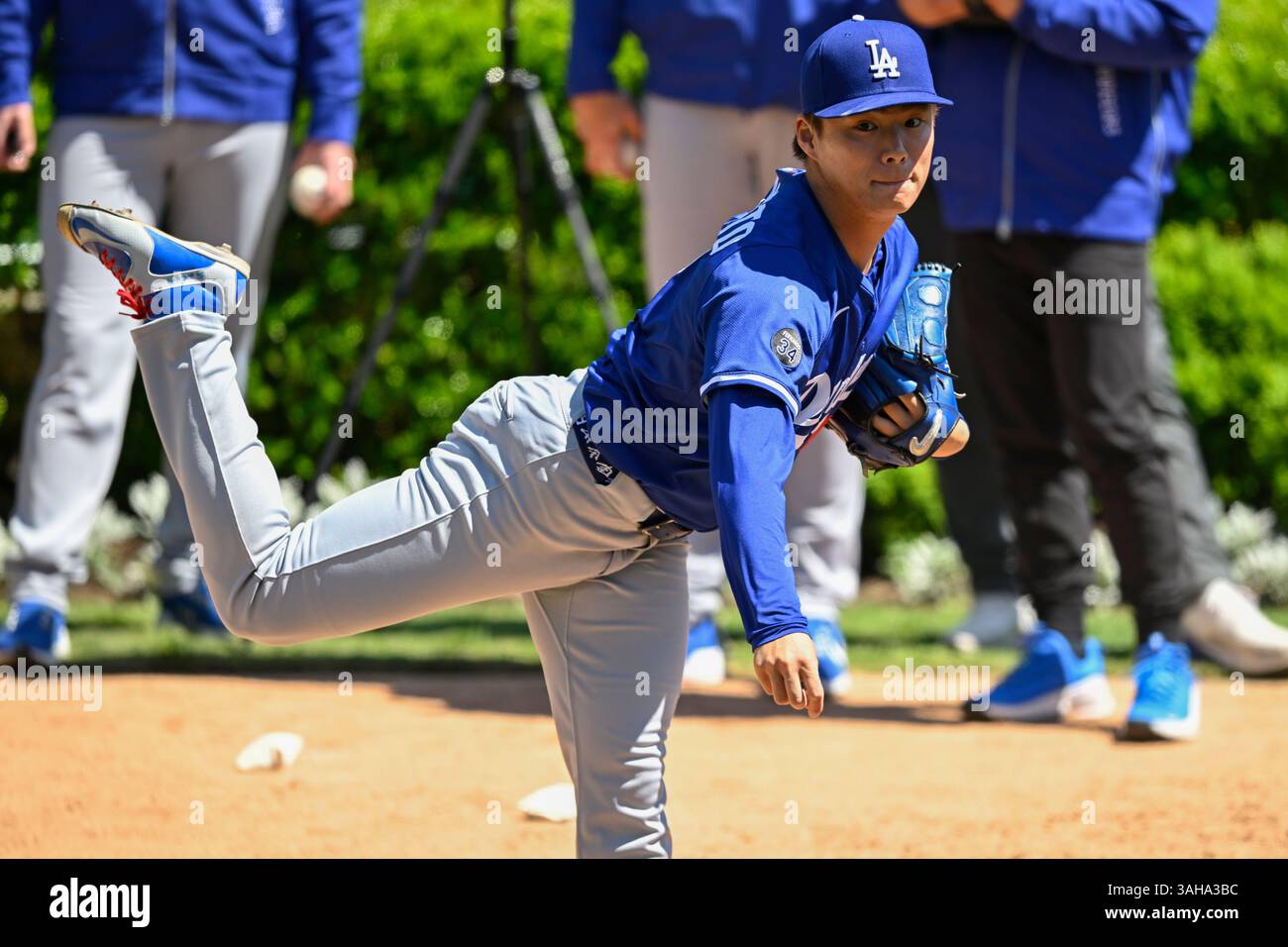 Los Angeles Dodgers pitcher Yoshinobu Yamamoto (18) practices pitching ...