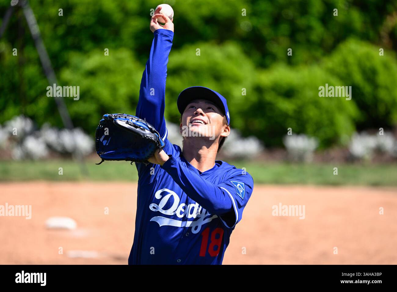 Los Angeles Dodgers pitcher Yoshinobu Yamamoto (18) practices pitching ...