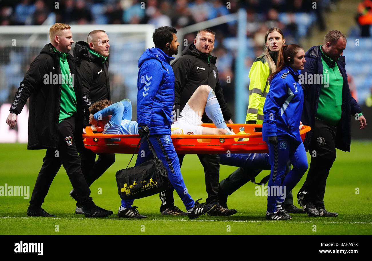 Coventry City's Victor Torp leaves the game with an injury during the ...