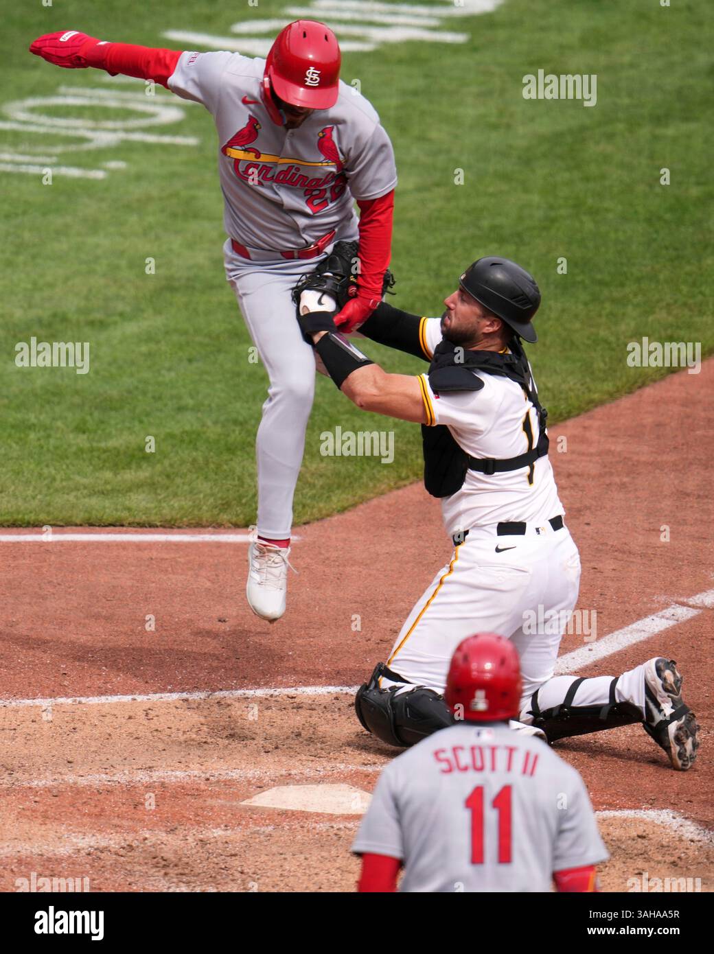 St. Louis Cardinals' Michael Siani, left, is tagged out by Pittsburgh ...