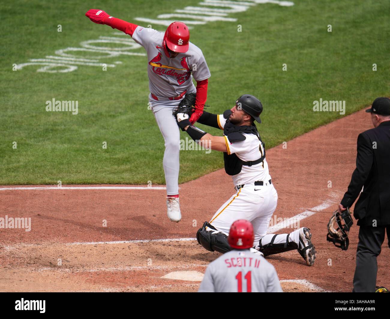 St. Louis Cardinals' Michael Siani, left, is tagged out by Pittsburgh ...