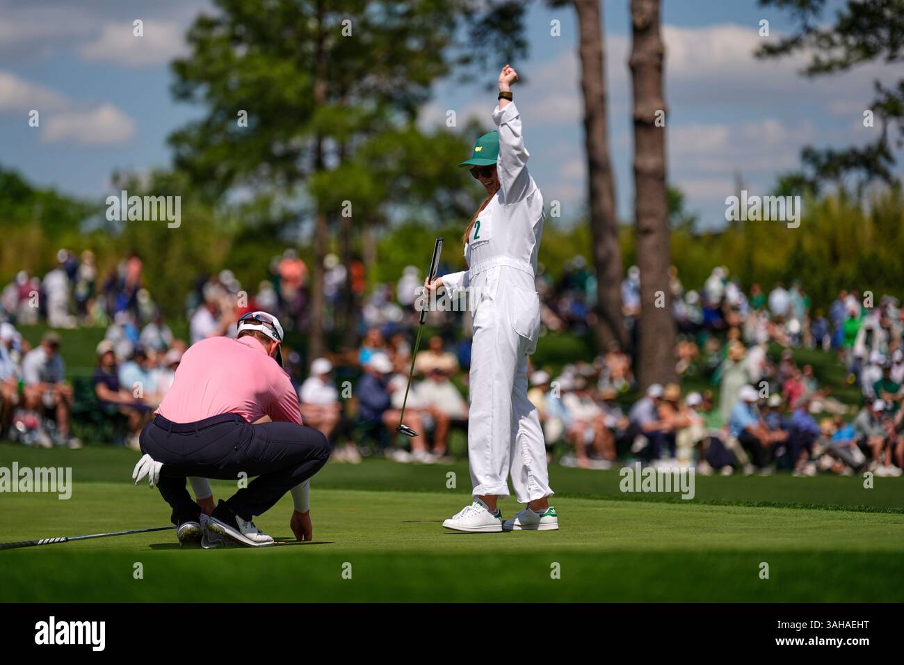 Max Greyserman and wife Alyssa Greyserman celebrate on the seventh hole ...