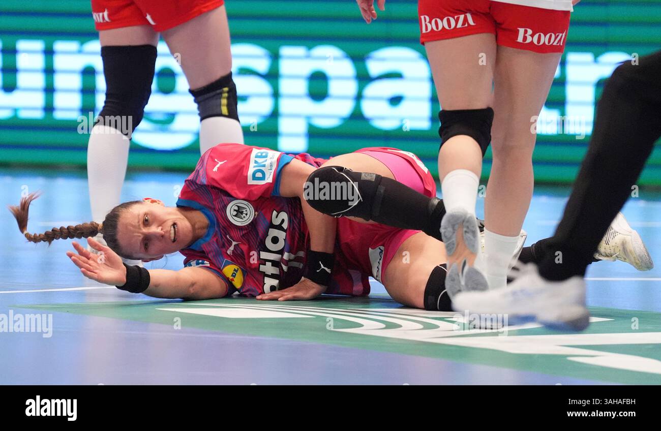 Germany's Xenia Smits, lies on the hall floor, during an International ...