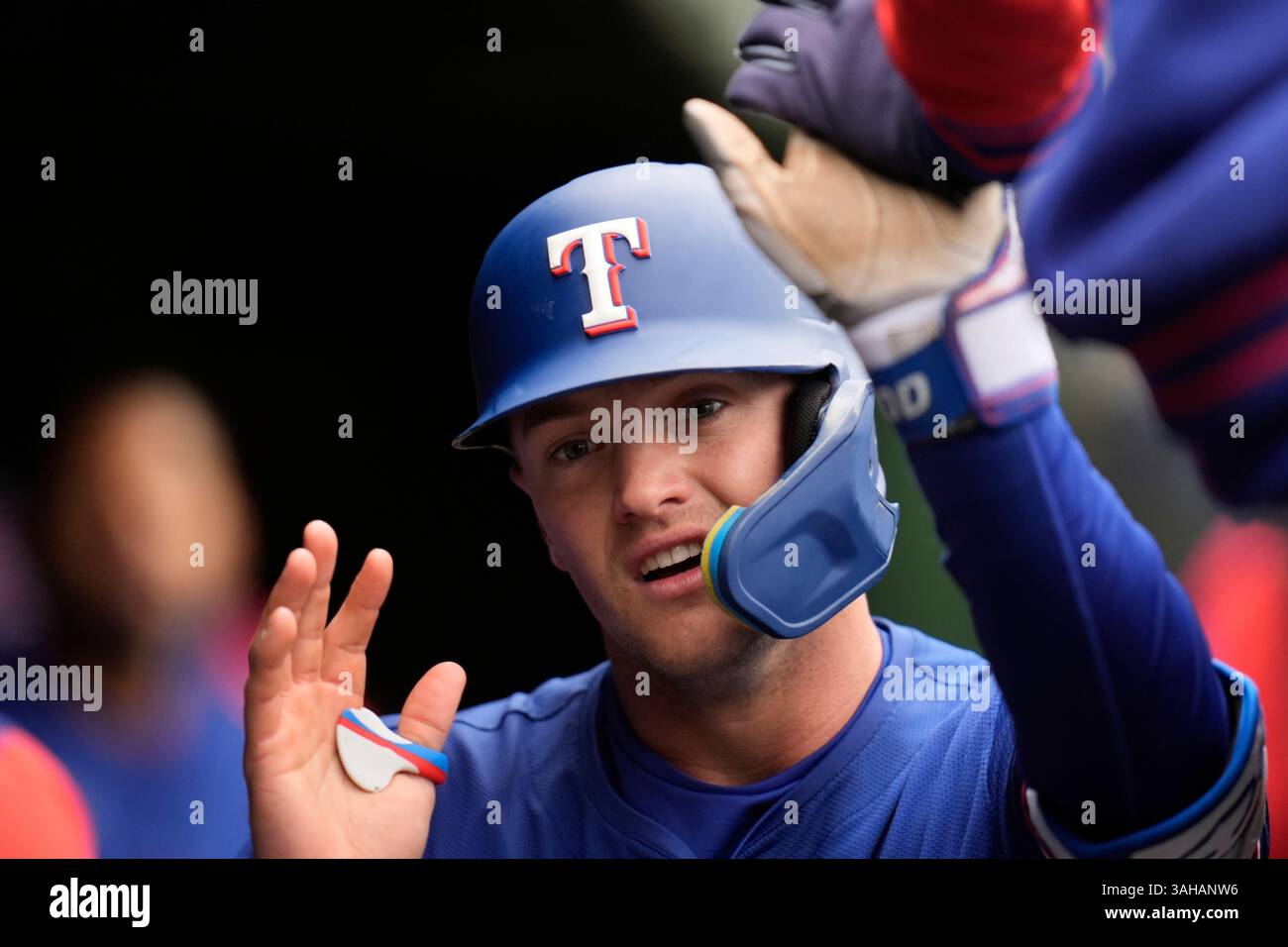 Texas Rangers' Marcus Semien (2) celebrates after scoring on a double ...