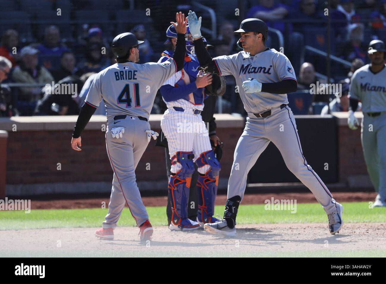 Miami Marlins' Matt Mervis, right, is greeted by Jonah Bride, left ...