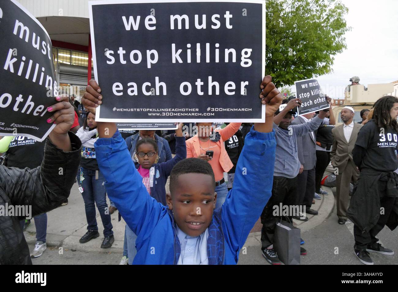 May 1, 2015 - Baltimore, MD, USA - Darrian Hill, 10, holds a sign ...