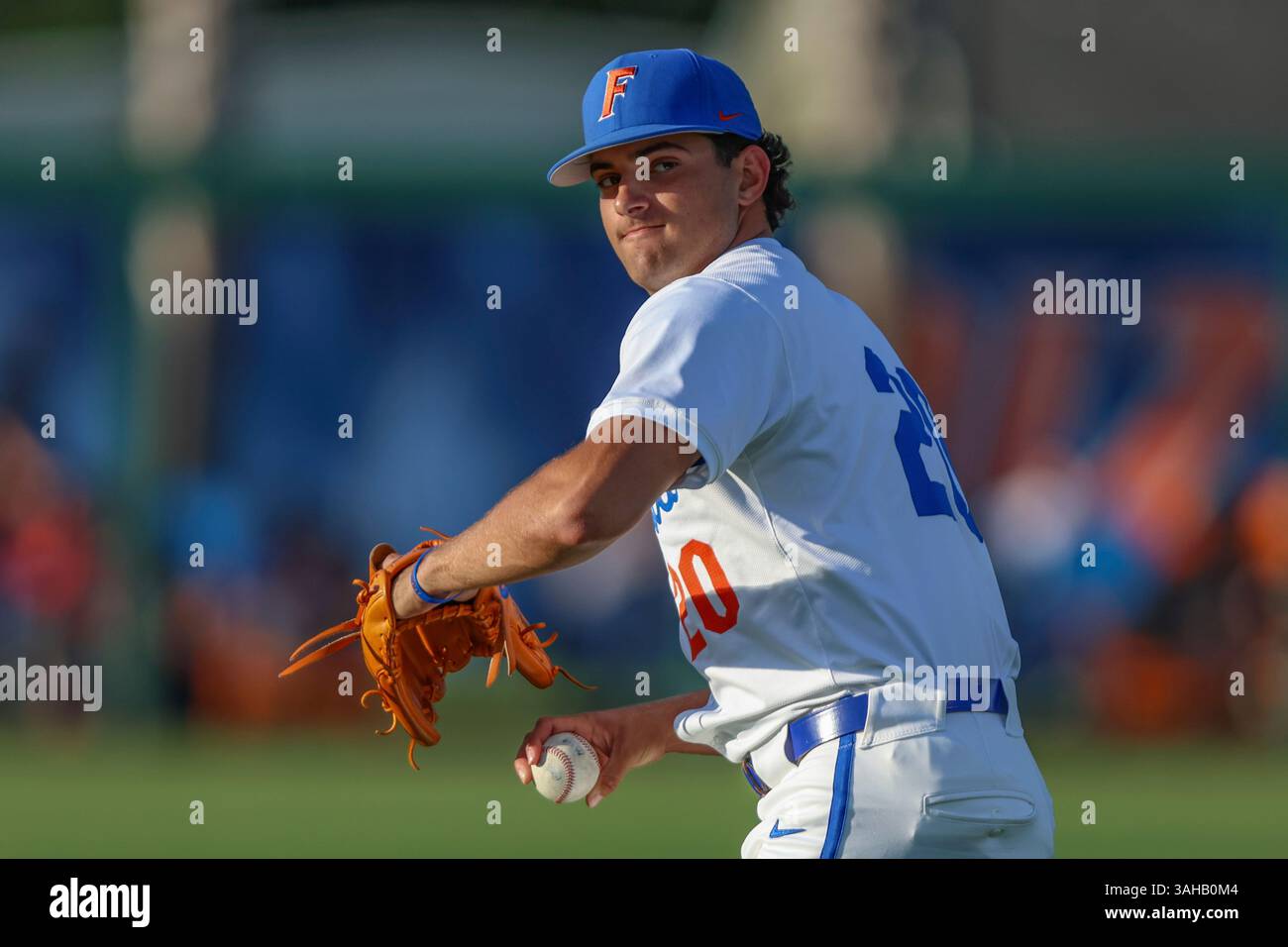 Florida pitcher Jake Clemente (20) warms up before an NCAA baseball ...