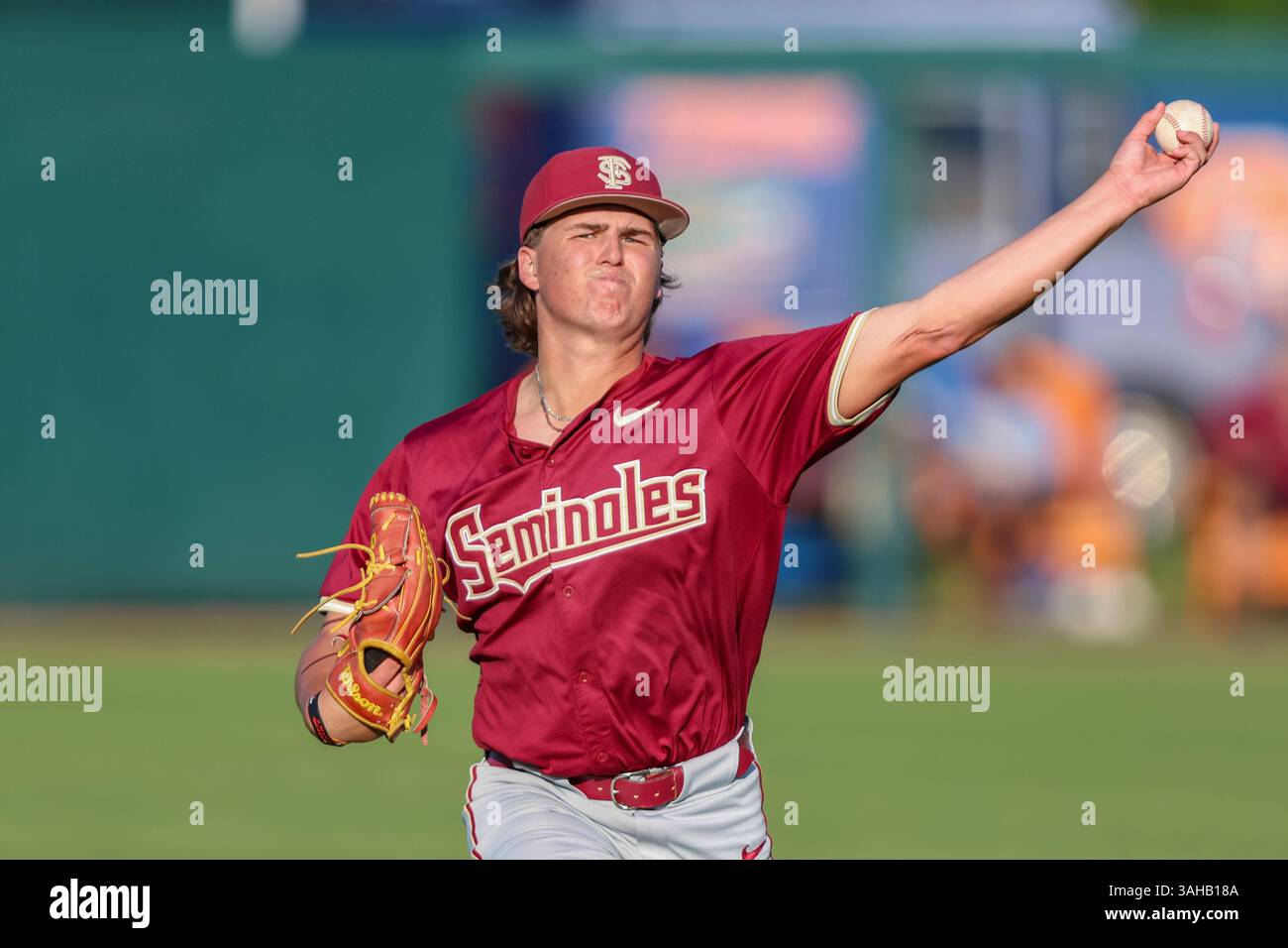 Florida State pitcher Mason McDougall (54) warms up before an NCAA ...