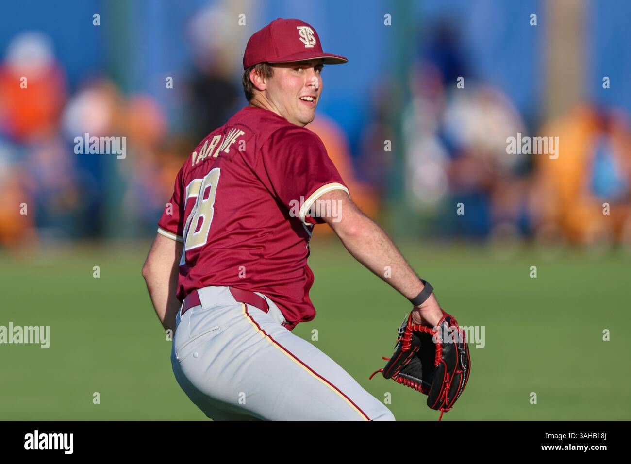 Florida State pitcher Jacob Marlowe (28) warms up before an NCAA ...
