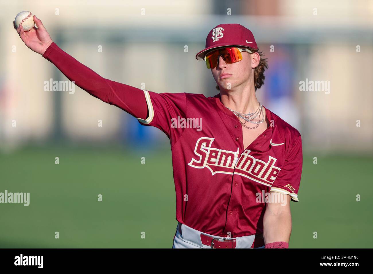 Florida State infielder Jace Estes (36) warms up before an NCAA ...