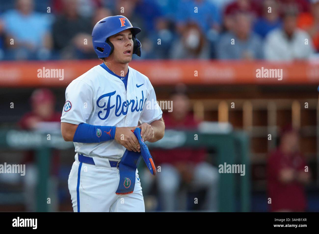 Florida infielder Blake Cyr (5) walks to first base during an NCAA ...