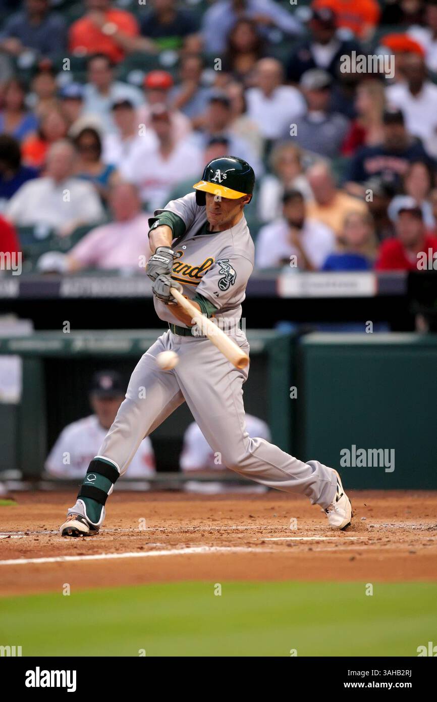APR 15 2015: Oakland Athletics outfielder Sam Fuld #23 hits a ground ...