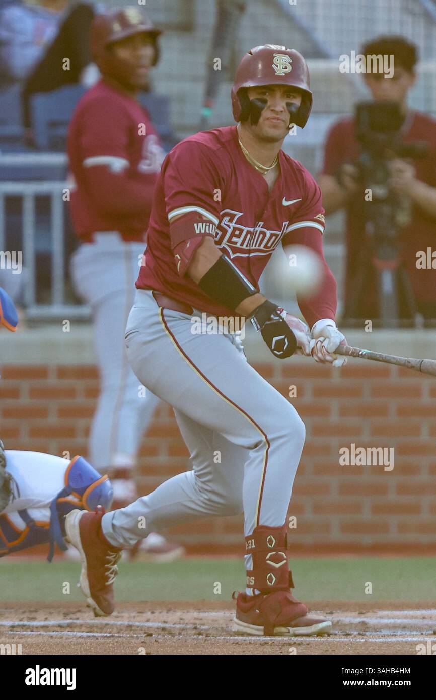 Florida State outfielder Max Williams (18) bats during an NCAA baseball ...