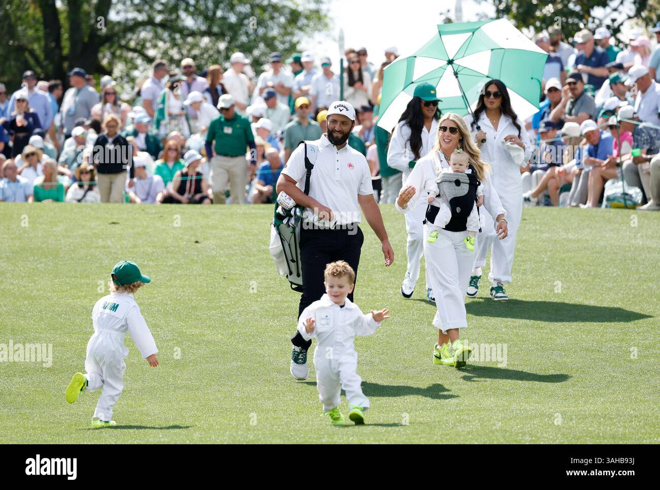 Augusta, United States. 09th Apr, 2025. Jon Rahm of Spain walks with ...
