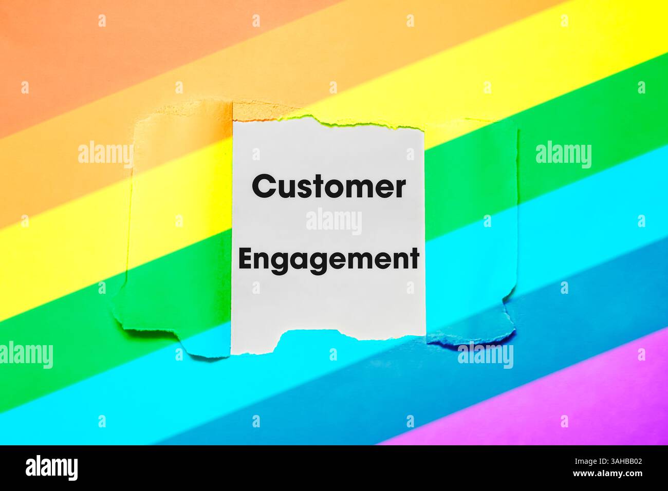 Torn Paper Revealing Customer Engagement Concept Stock Photo - Alamy