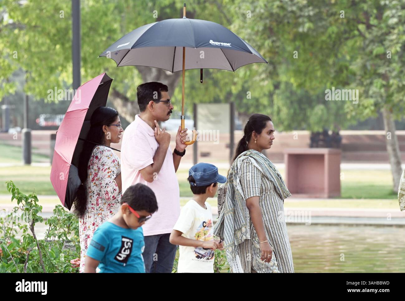 NEW DELHI, INDIA - APRIL 9: Visitors out on a hot summer afternoon at ...