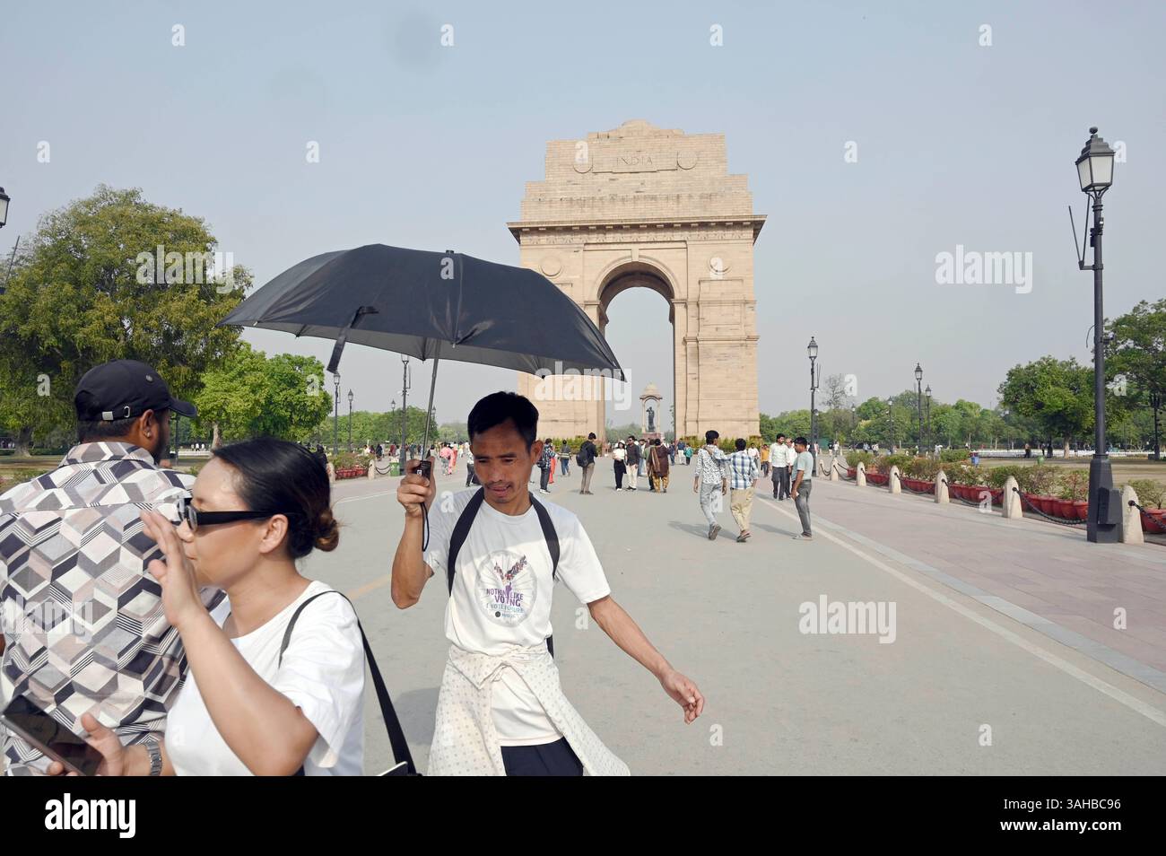 NEW DELHI, INDIA - APRIL 9: Visitors out on a hot summer afternoon at ...