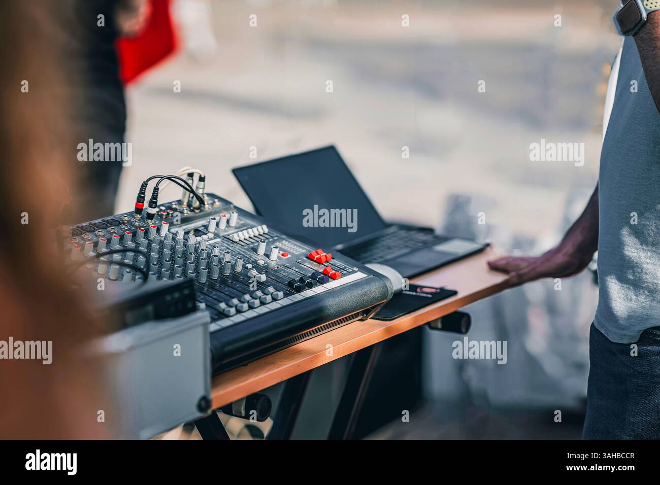 Professional audio mixing console with laptop set, outdoor event. Sound ...
