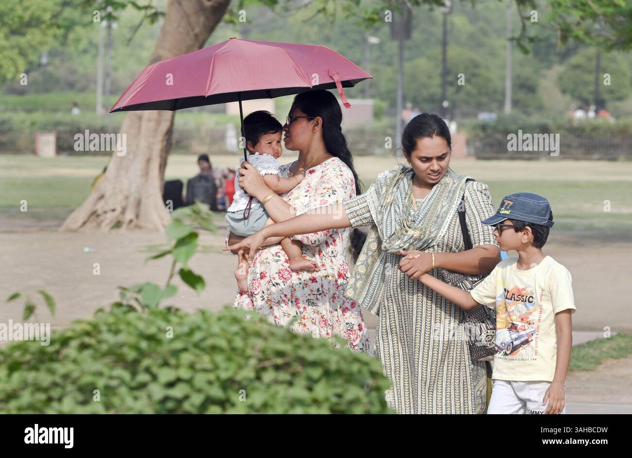 NEW DELHI, INDIA - APRIL 9: Visitors out on a hot summer afternoon at ...