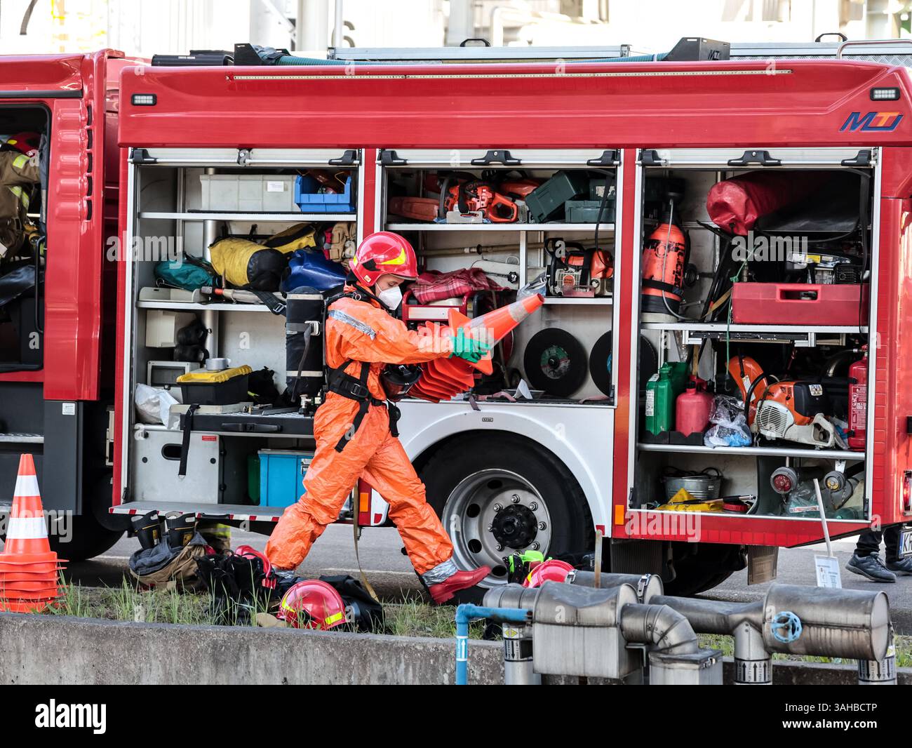 Fire-fighter dressed in a uniform walks as he performs JOINT PATROL-25 ...