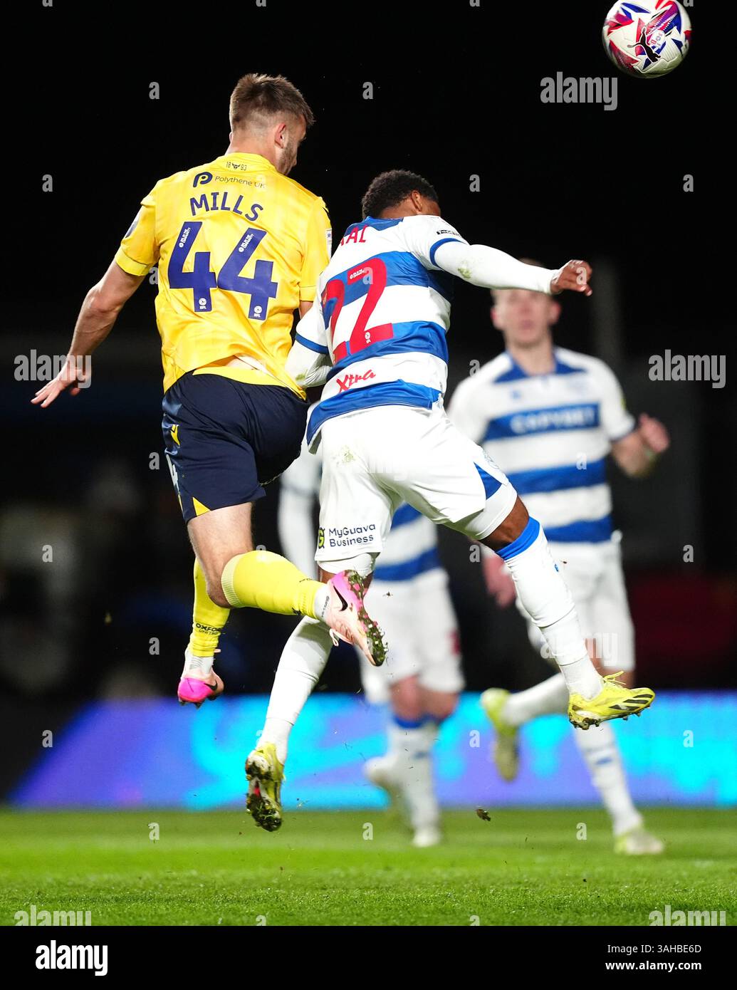 Oxford United's Stanley Mills (left) scores their side's first goal of ...