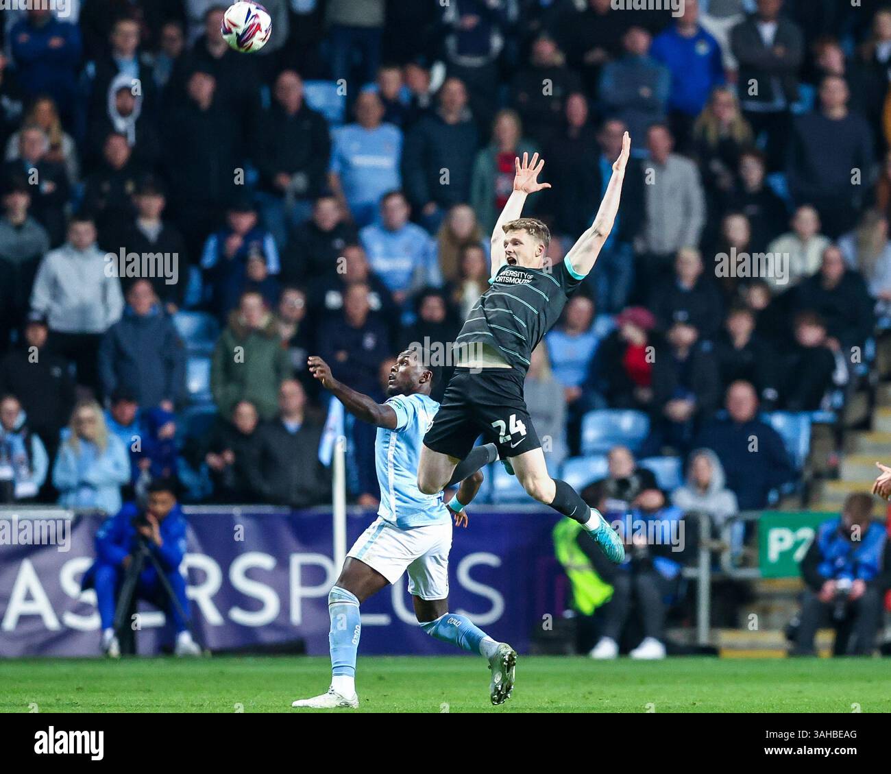 #10, Ephron Mason-Clark of Coventry City & #24, Terry Devlin of ...