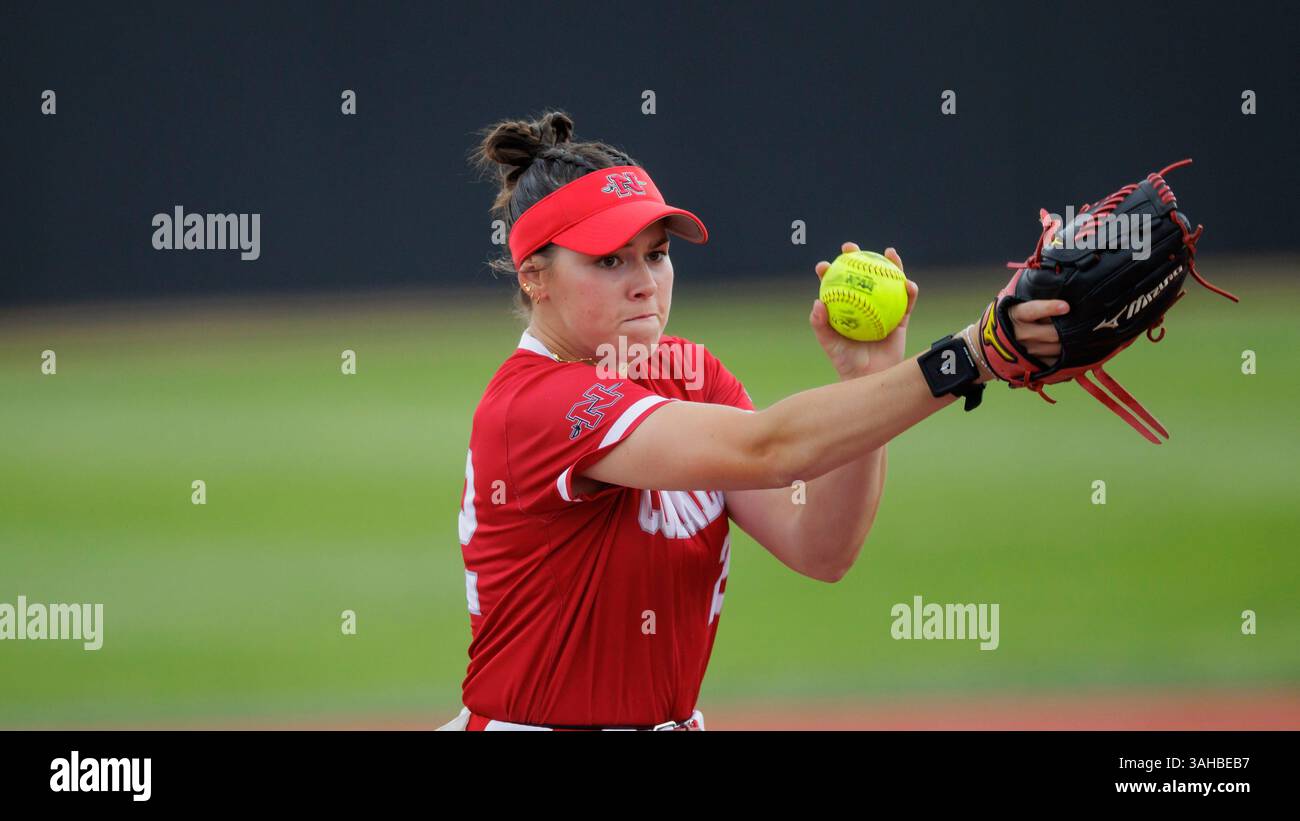 Nicholls starting pitcher Molly Yoo (22) throws during an NCAA softball ...